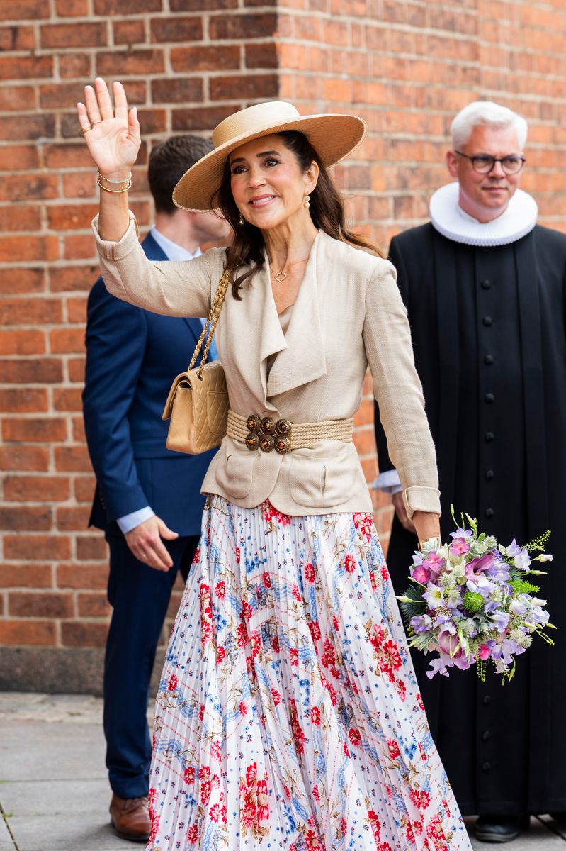 Queen Mary turns heads in a vibrant scarlet dress and romantic cinched ...