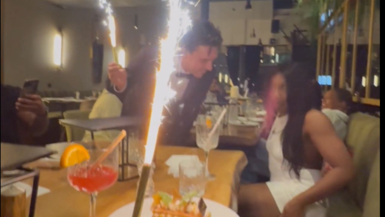 Birthday cake candle briefly burns a guest at a restaurant