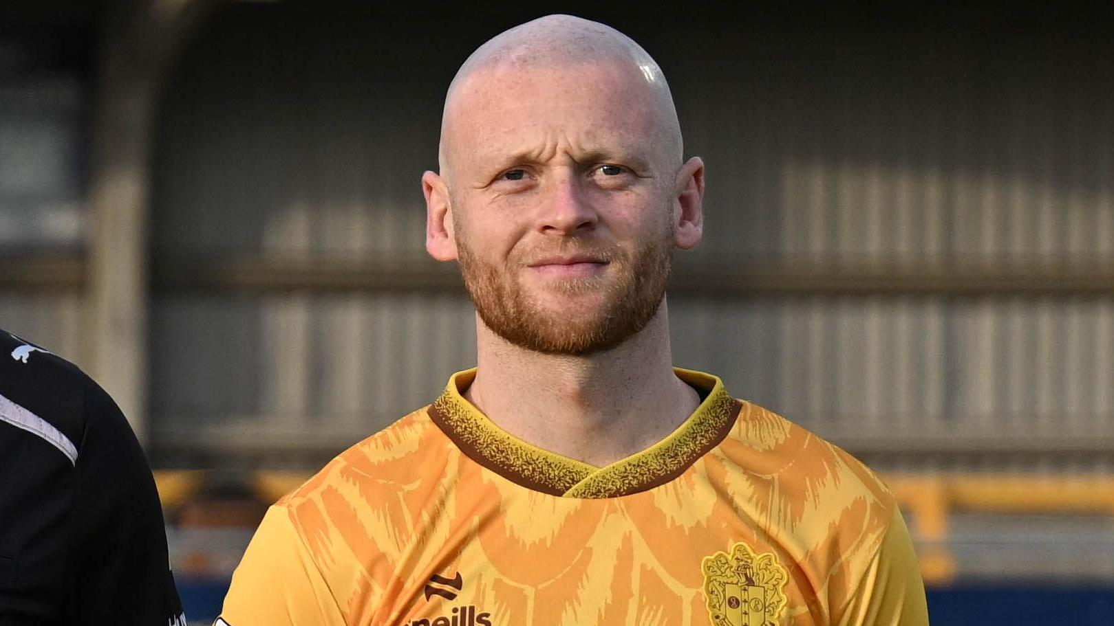Taylor named Sutton captain and signs new deal