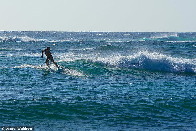 What it's like to learn to surf at 50 in the birthplace of the watersport