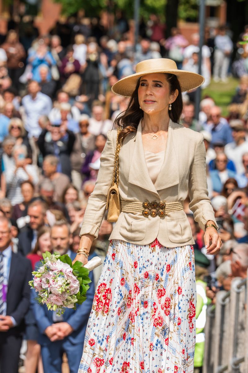 Queen Mary turns heads in a vibrant scarlet dress and romantic cinched ...