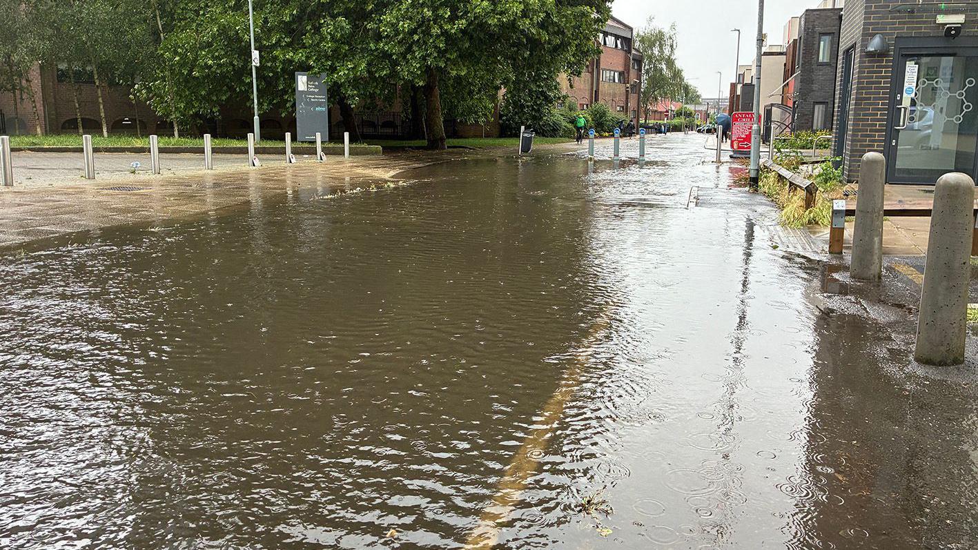 Travel disruption as heavy rain causes flash floods
