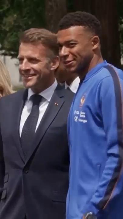 President Emmanuel Macron visits France's national soccer team ahead of ...