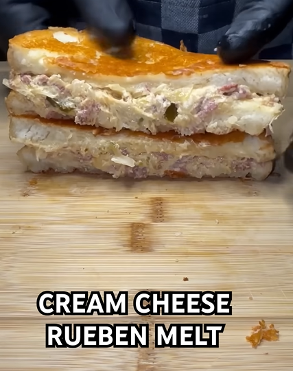 Cheese-crusted Reuben melt 🧀🥪🔥 stuffed with a creamy Reuben filling ...