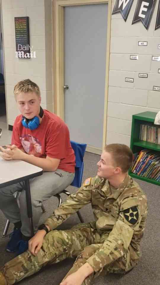 Soldier surprises little brother at school after three-year separation