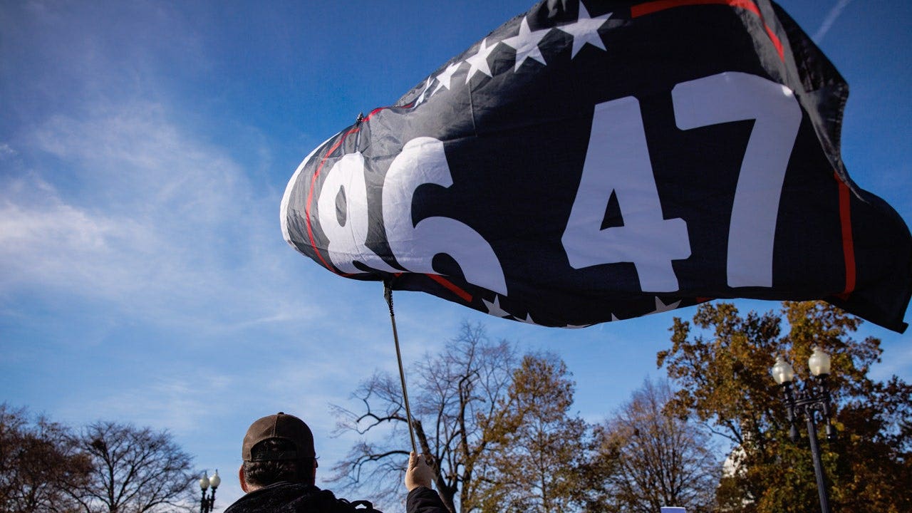 Obama judge clears left-wing group to fly ominous flag aimed at Trump ...