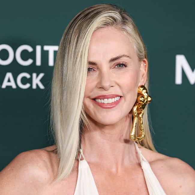 Charlize Theron rocks long curly hair in new interview