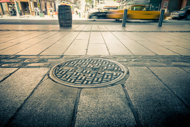 Fifteen consenting men spotted spending three hours in two manholes ...
