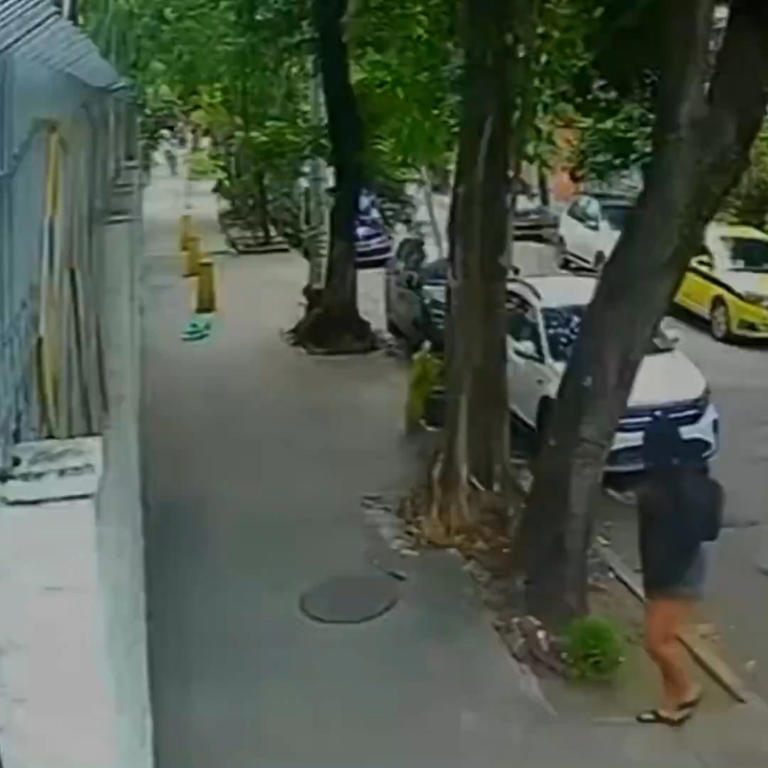 Terrifying moment woman falls down a manhole after cover gives way ...