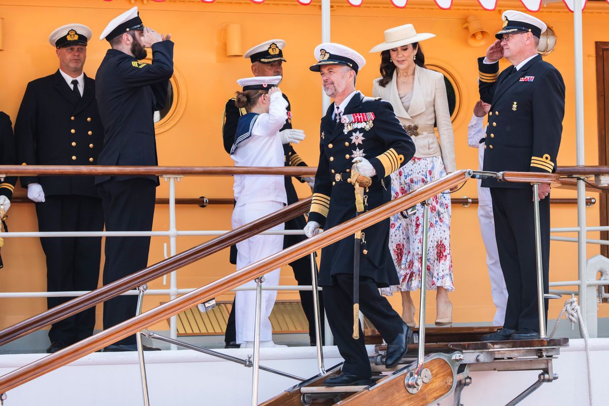 Queen Mary turns heads in a vibrant scarlet dress and romantic cinched ...