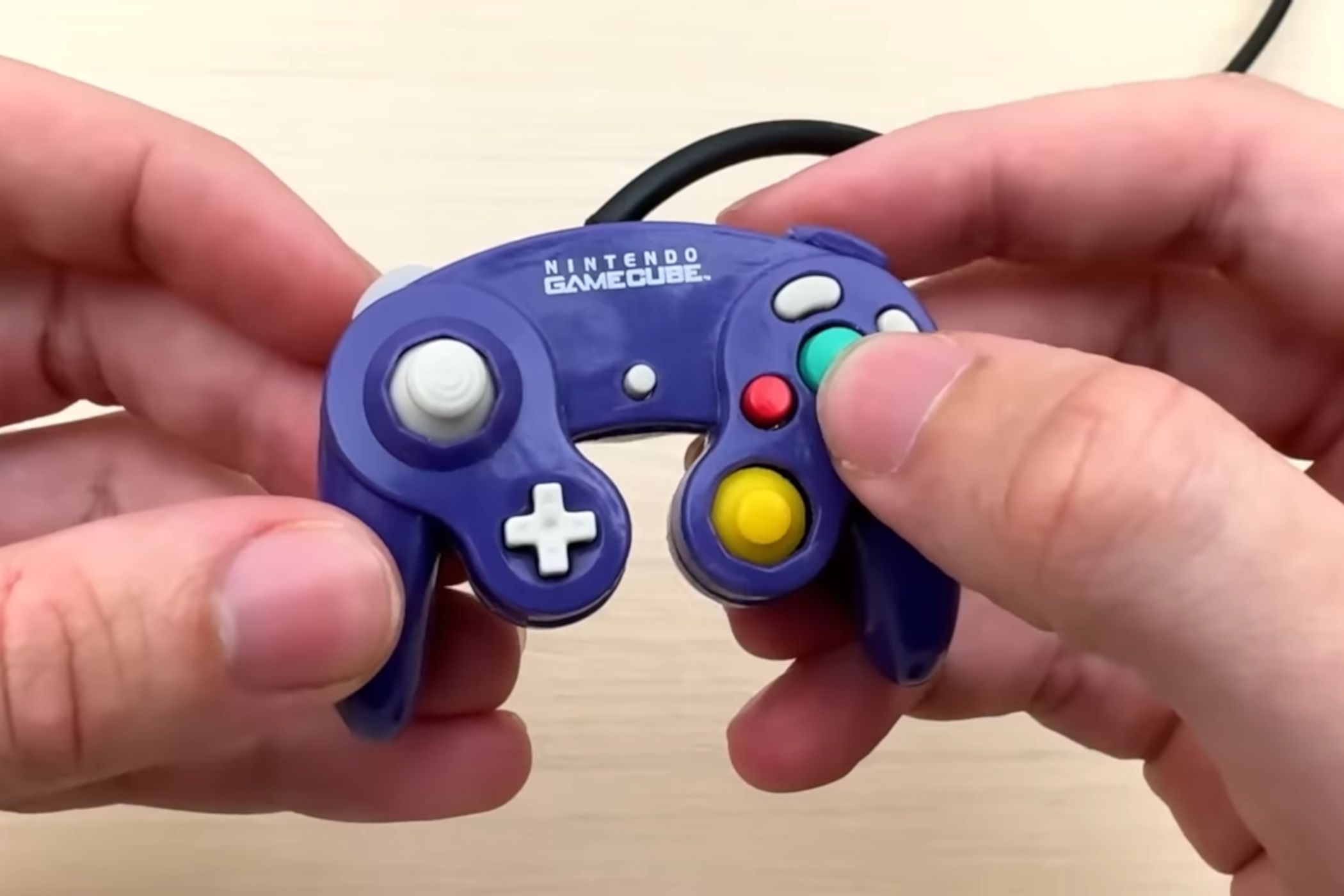 Someone turned a GameCube keychain into an actual working controller ...