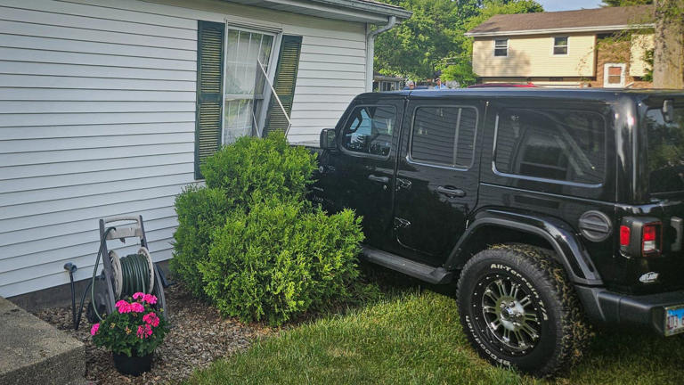 Jeep crashes into Cary home