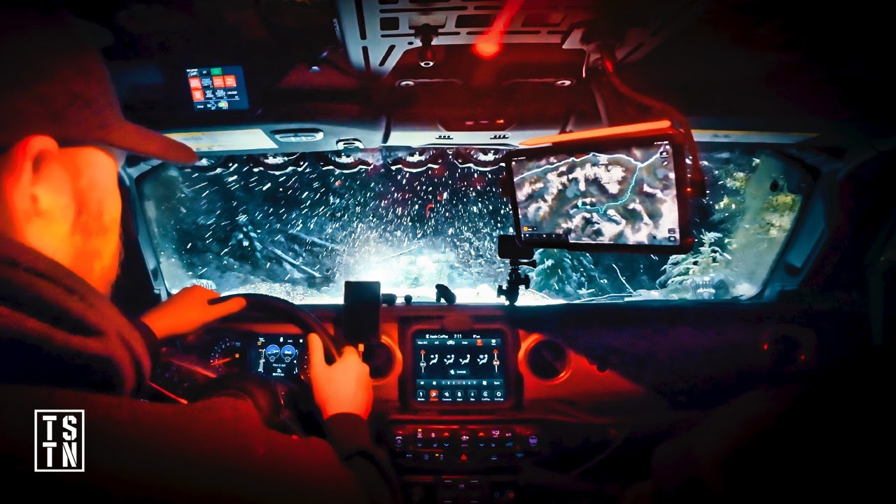 Navigating a snowstorm off-road in the dark