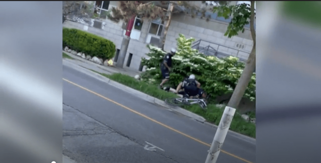 Police tackle Toronto cyclist after he allegedly blew through stop sign