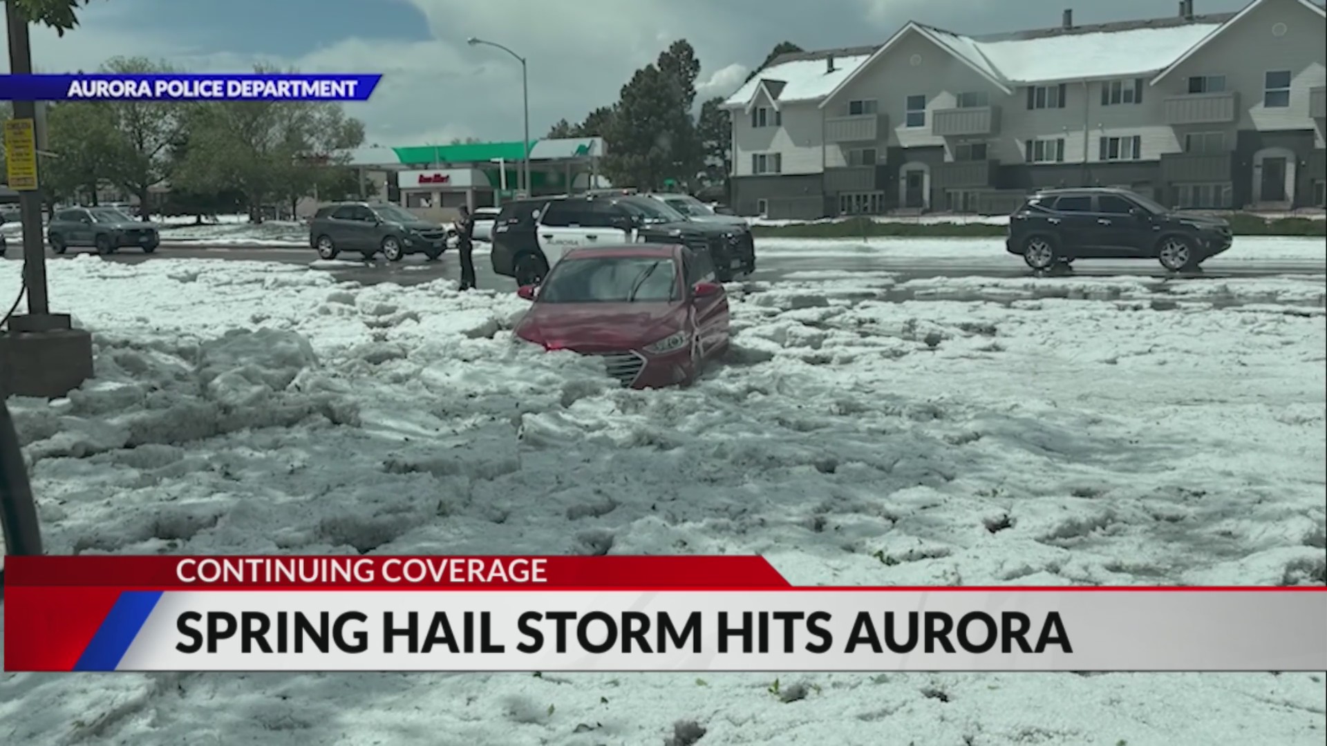 Woman rescued after driving into hidden flood in Aurora