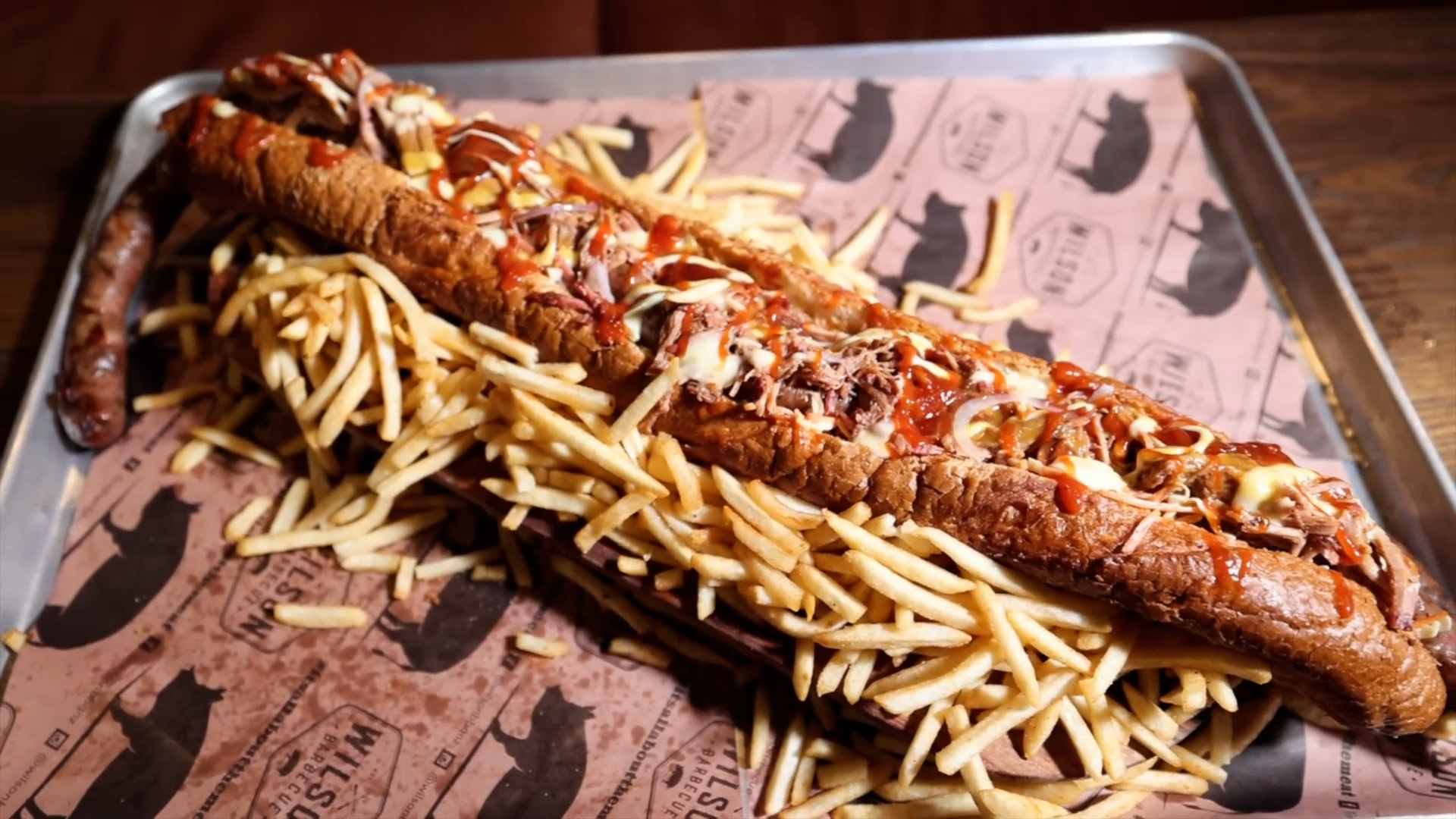 Girl attempts undefeated 1-meter hot dog challenge loaded with pulled ...