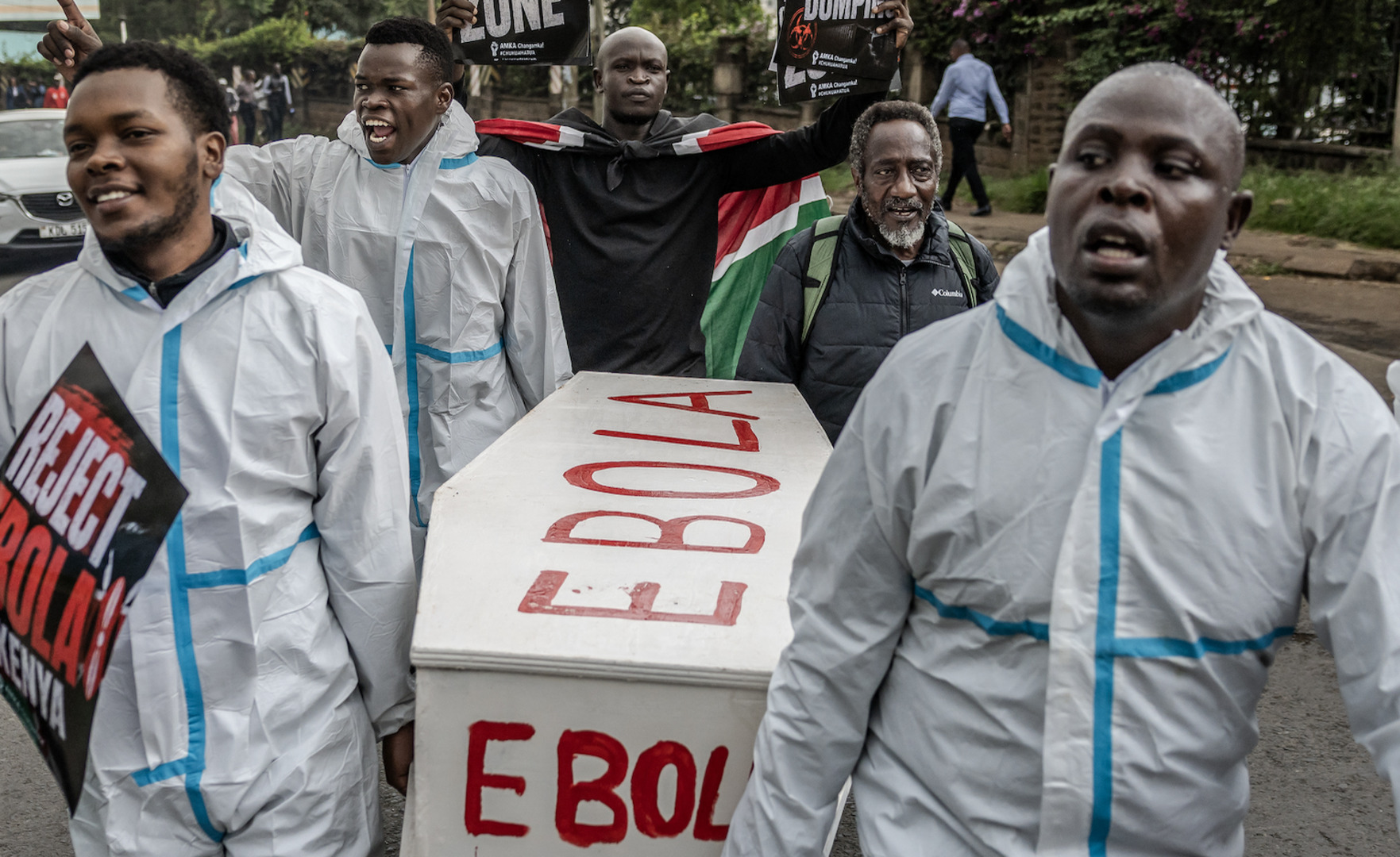 Protesters use 'Ebola coffin' to rally against US quarantine centre in ...