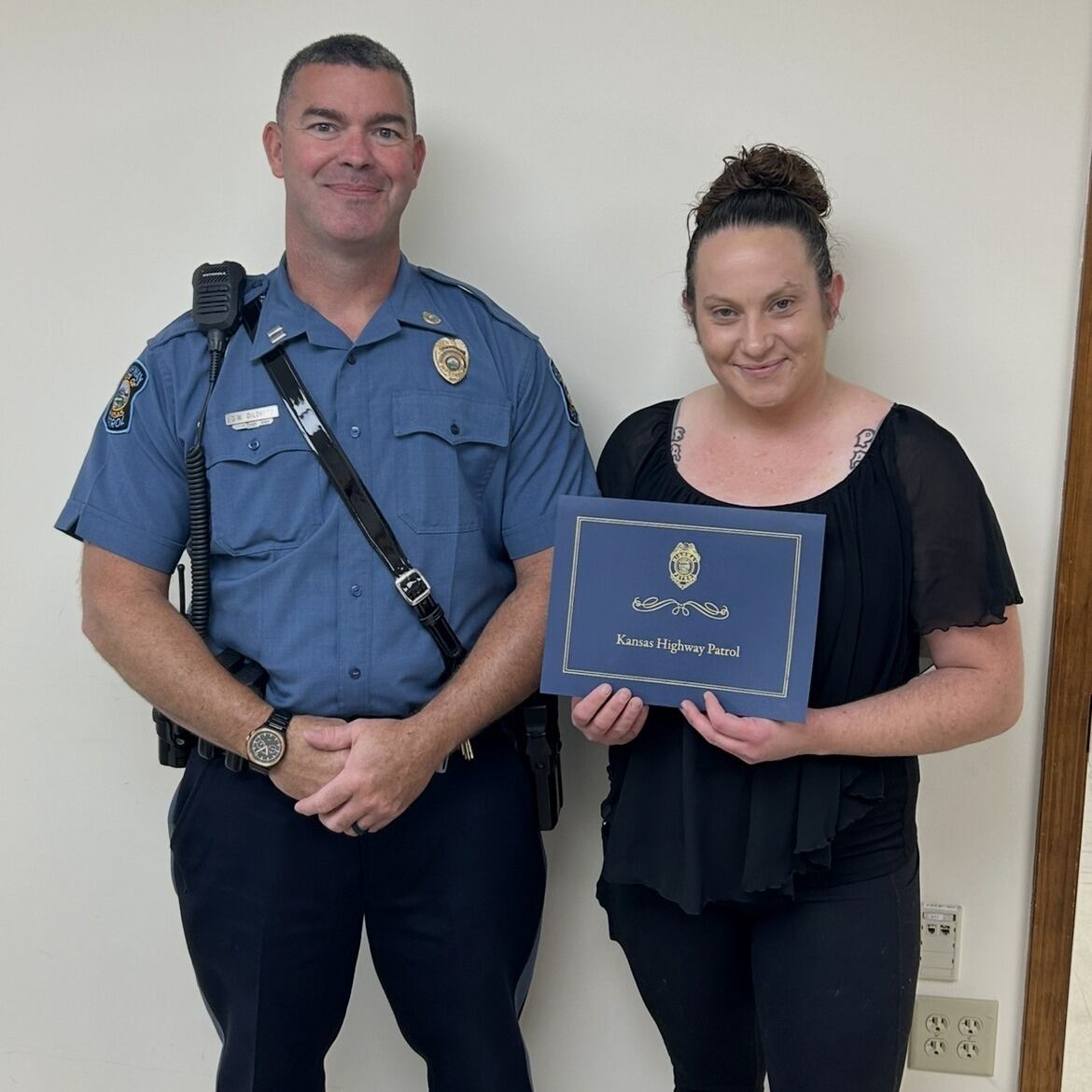 Woman saves person trapped inside flaming vehicle, presented with KHP award