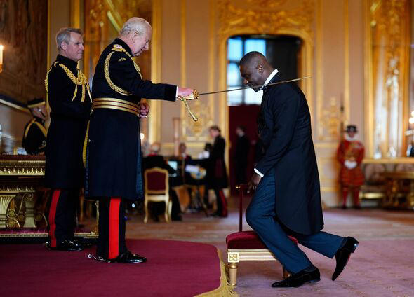 Idris Elba knighted by King Charles as he's joined by his wife at ...