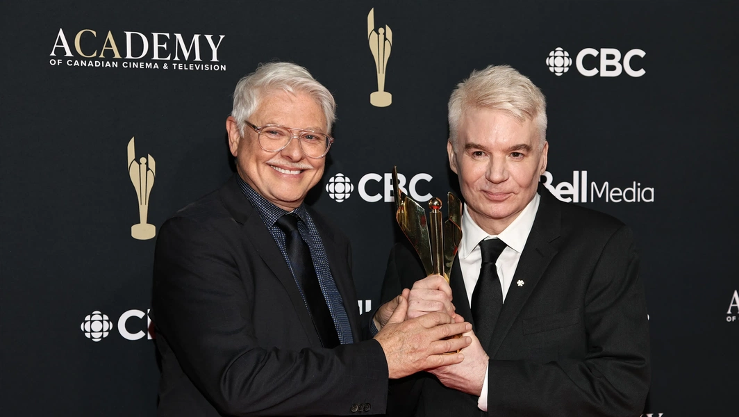 Mike Myers' silver-haired look turns heads at Icon Award win