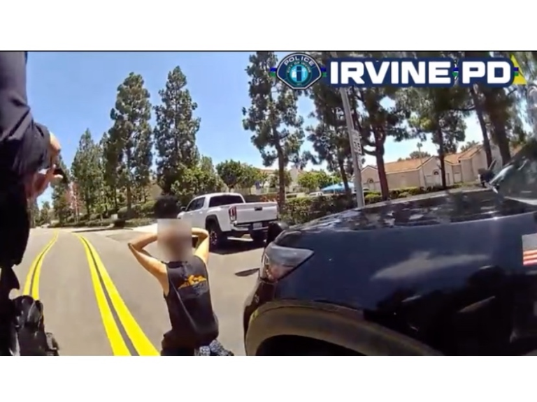 Road rage driver pointed gun at motorist while stopped at traffic light ...