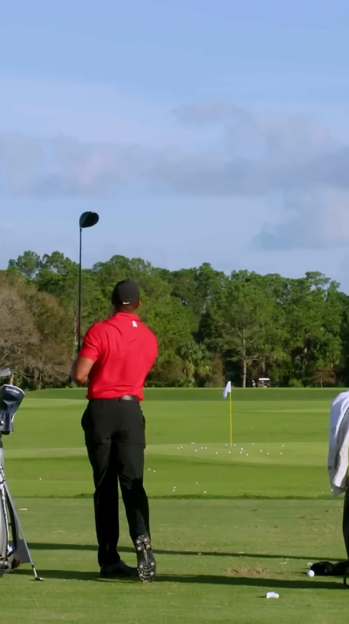 Rory McIlroy hits a drive so far even Tiger Woods had to watch