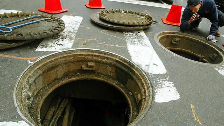 New York police investigate videos of men emerging from city's sewer system