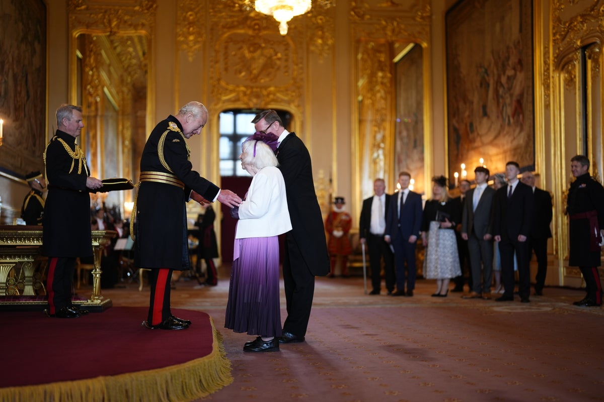 King ‘upset’ over Post Office scandal as oldest victim receives honour