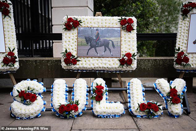 Mourners honour female soldier at funeral after she was thrown from ...