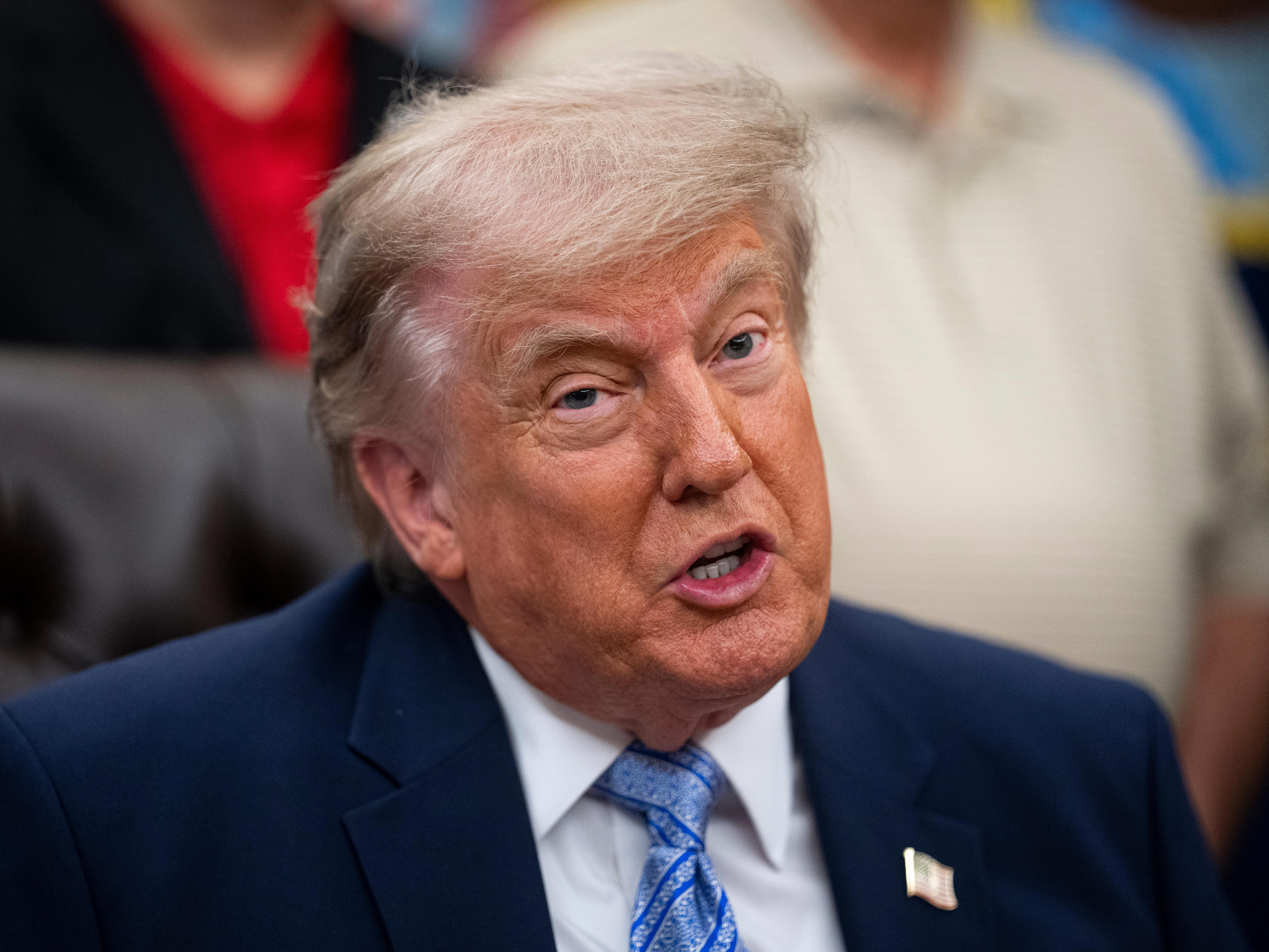 Trump quietly signed a scaled-back AI executive order after delaying it ...