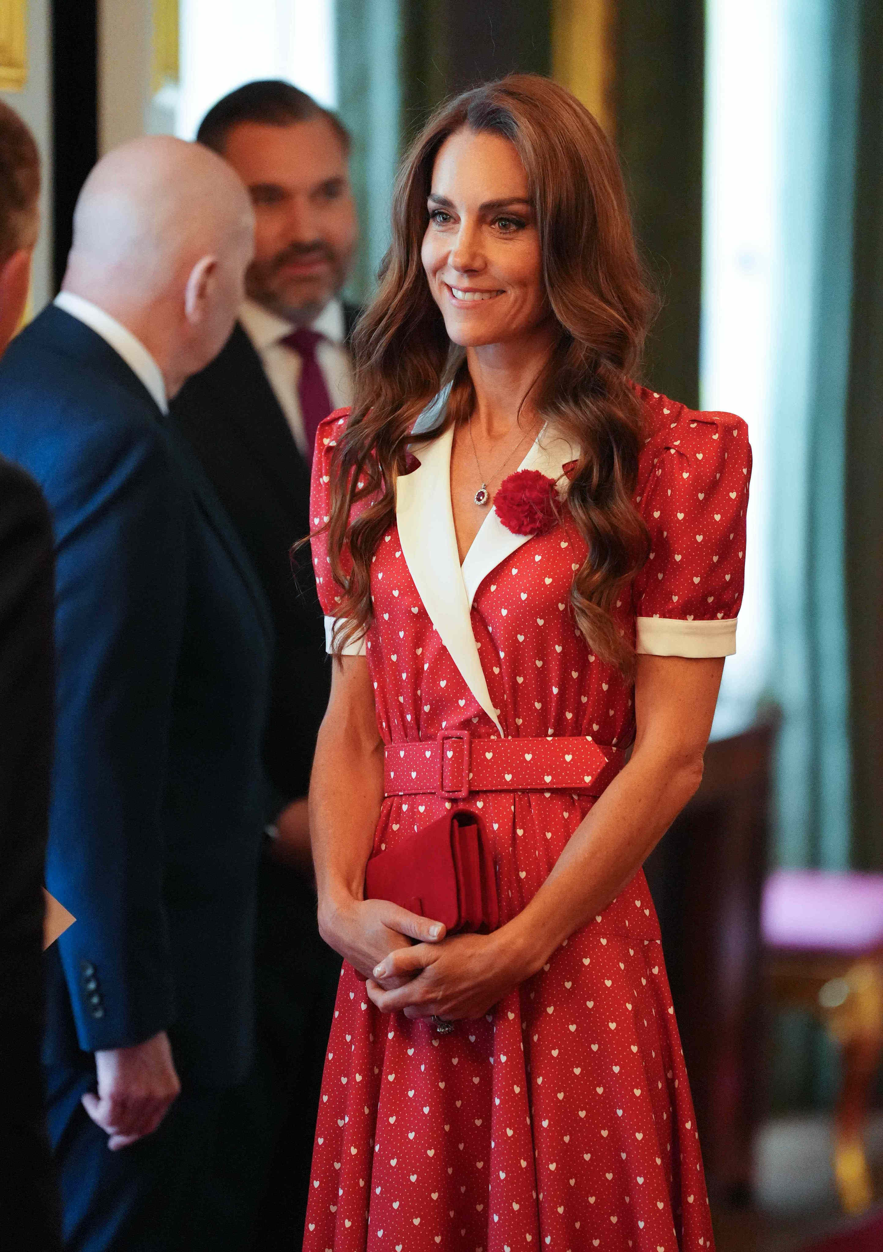 Kate Middleton makes a striking appearance in red polka dots while ...