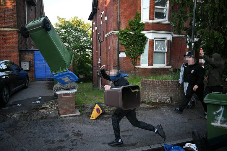 Riot police deployed as objects thrown at officers during Henry Nowak ...