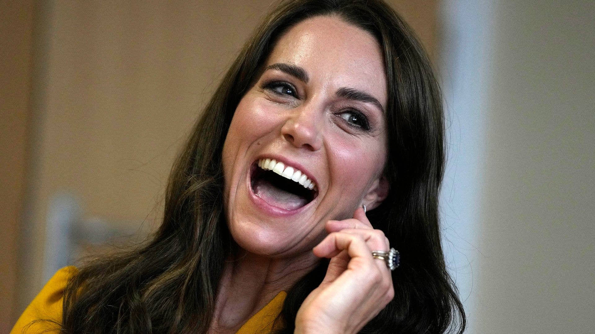 Sun-kissed Princess Kate masters heatwave dressing in silk mini skirt