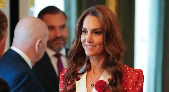 Princess Kate beams in red as she joins King and Queen at cancer reception