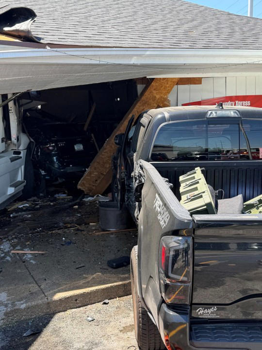 Six people hurt after semi crashes into laundromat on West Jefferson