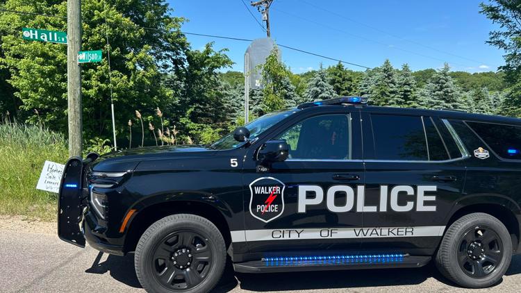Motorcyclist hospitalized after striking canoe that had fallen off car