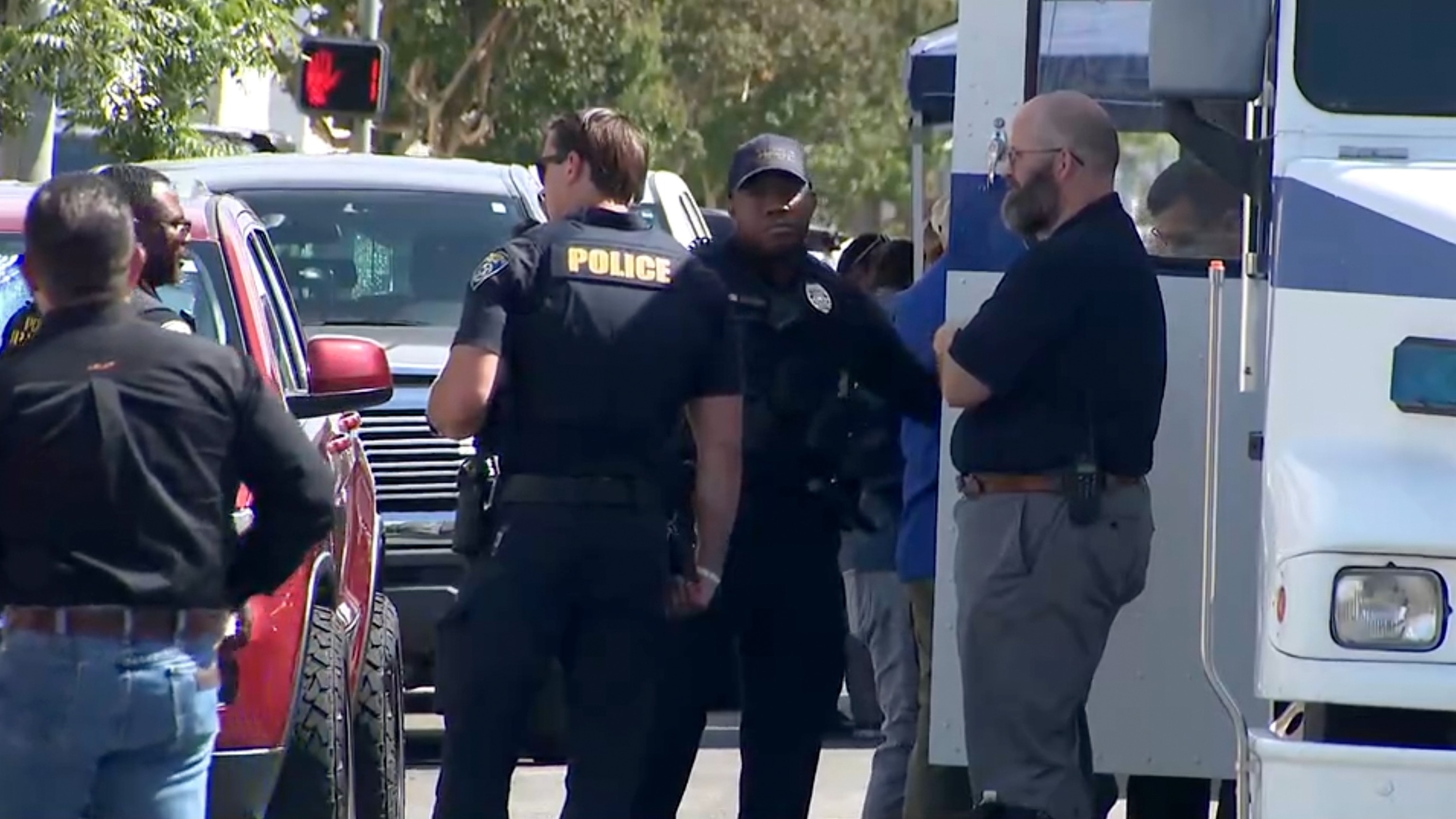 Standoff underway after bomb threat reported at bank: Police