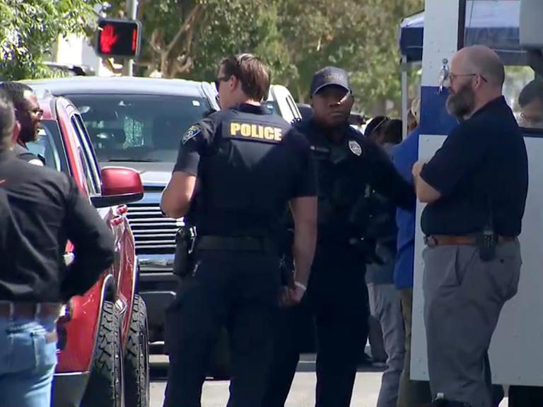 Hostages released unharmed, suspect dead after hours-long standoff at ...