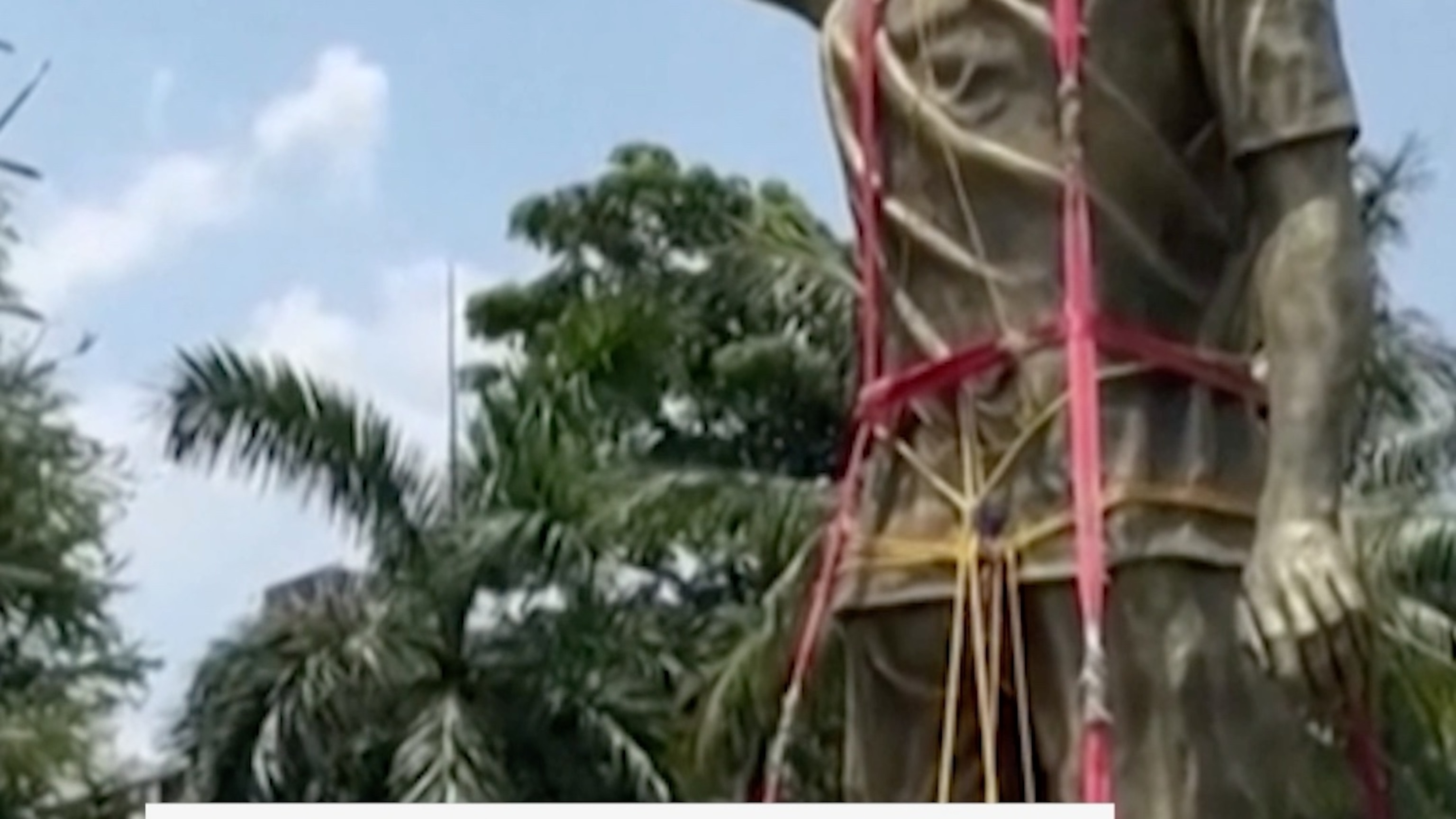 A 70-foot statue of soccer star Lionel Messi was taken down in Kolkata ...
