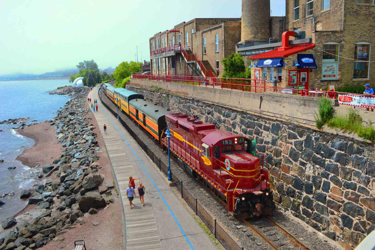 This summer-only train runs along Lake Superior’s shores—with a domed ...
