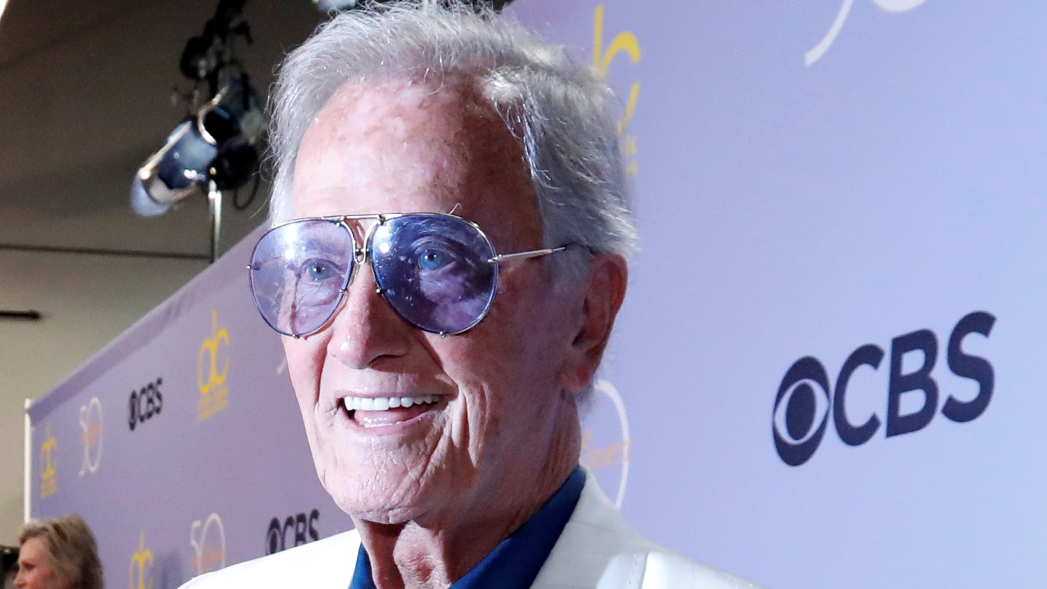 Legendary pop singer makes rare appearance on 92nd birthday