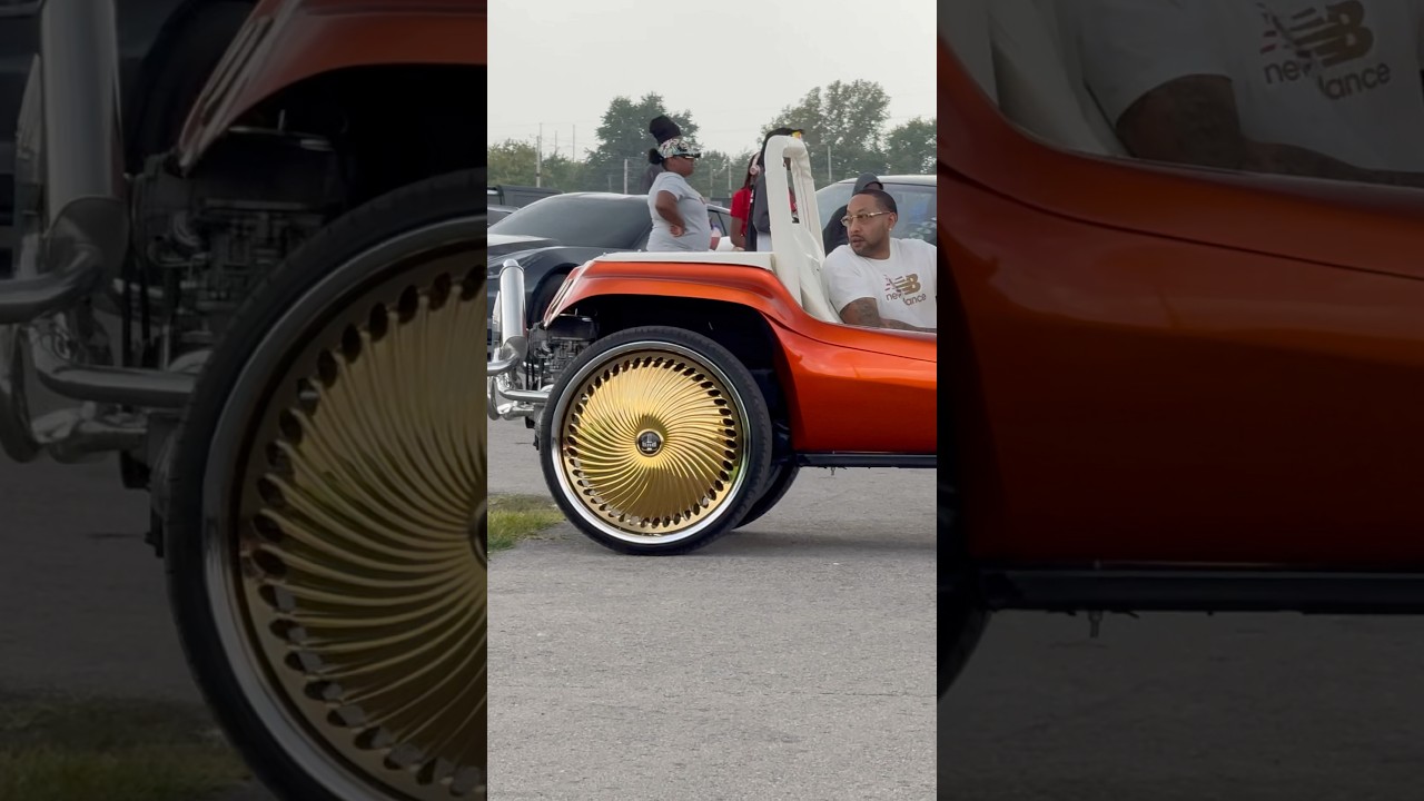 Orange dune-buggy on gold 28” DUB floaters
