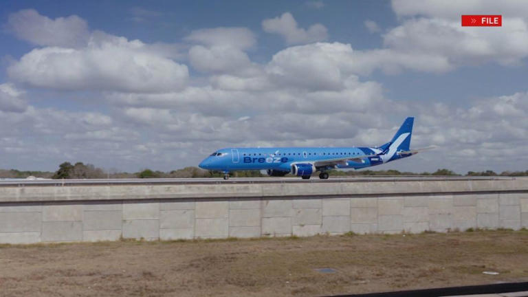 Newport man accused of inappropriately touching minor on flight to ...
