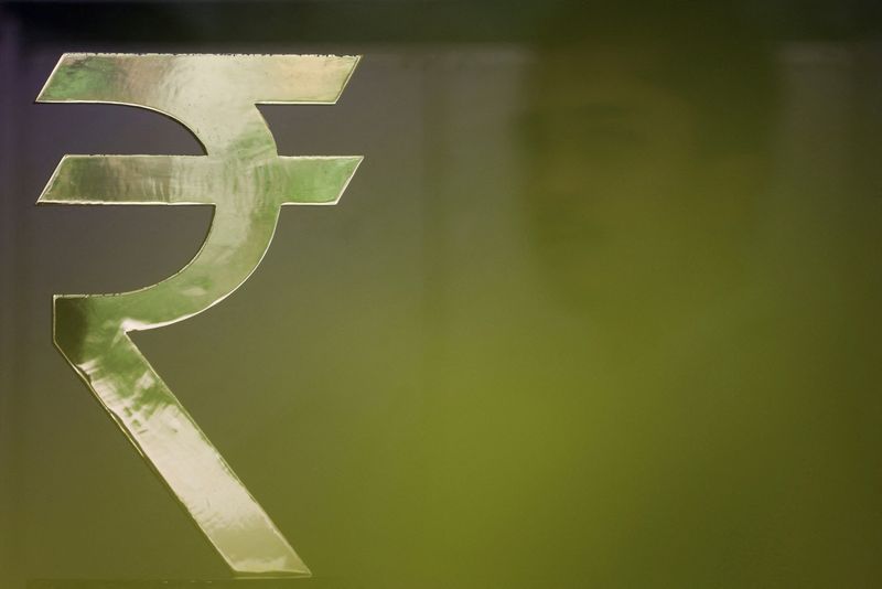 Indian rupee hits one-week low as crude surges; RBI likely steps in