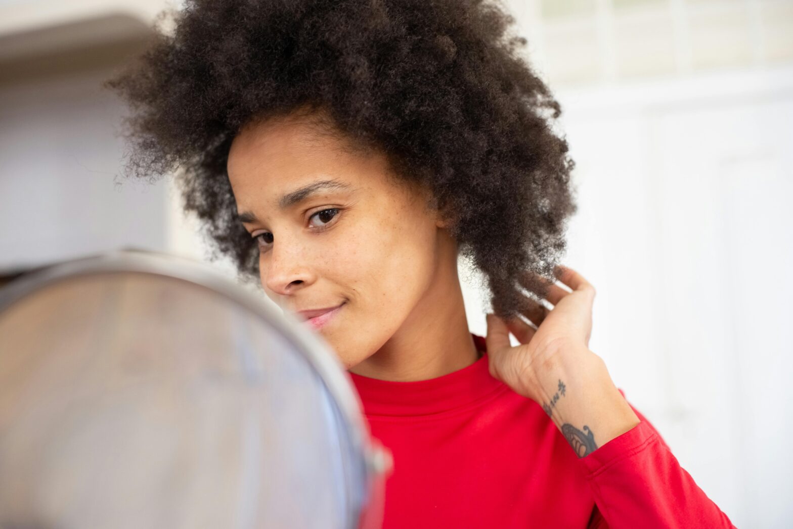Want softer, stronger curls? Start doing hot oil treatments