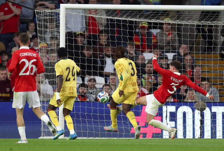 Soccer-Wales equalise late to draw with World Cup-bound Ghana