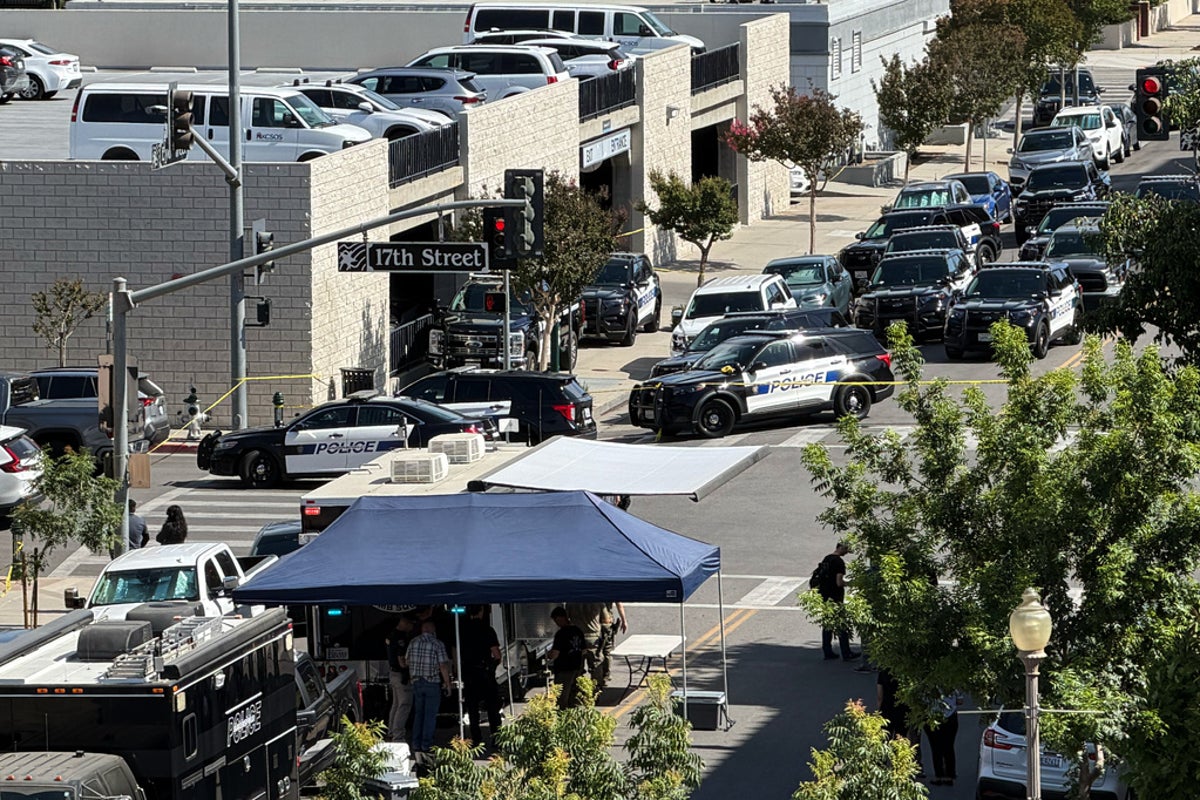 Second hostage freed as Chase Bank standoff continues - Live