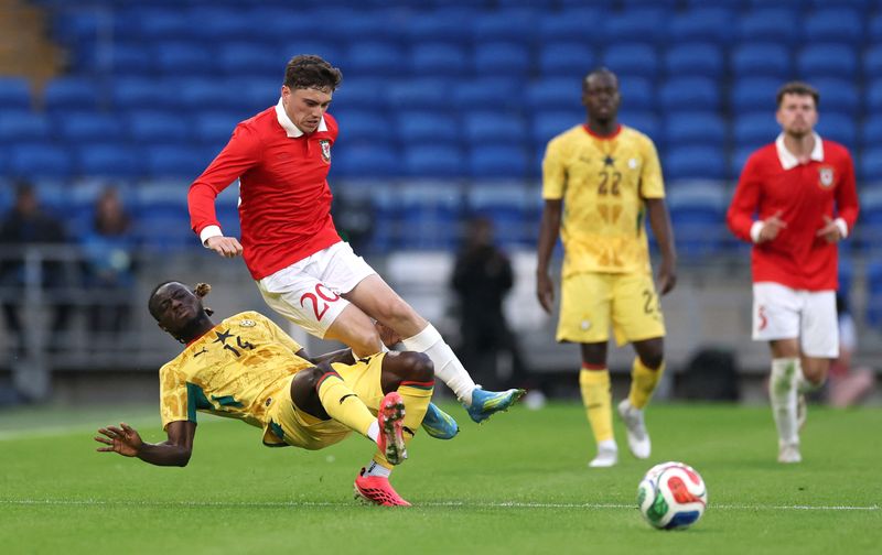 Soccer-Wales equalise late to draw with World Cup-bound Ghana