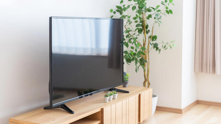 Wall mount vs. TV stand: Which is better for your home theater setup?
