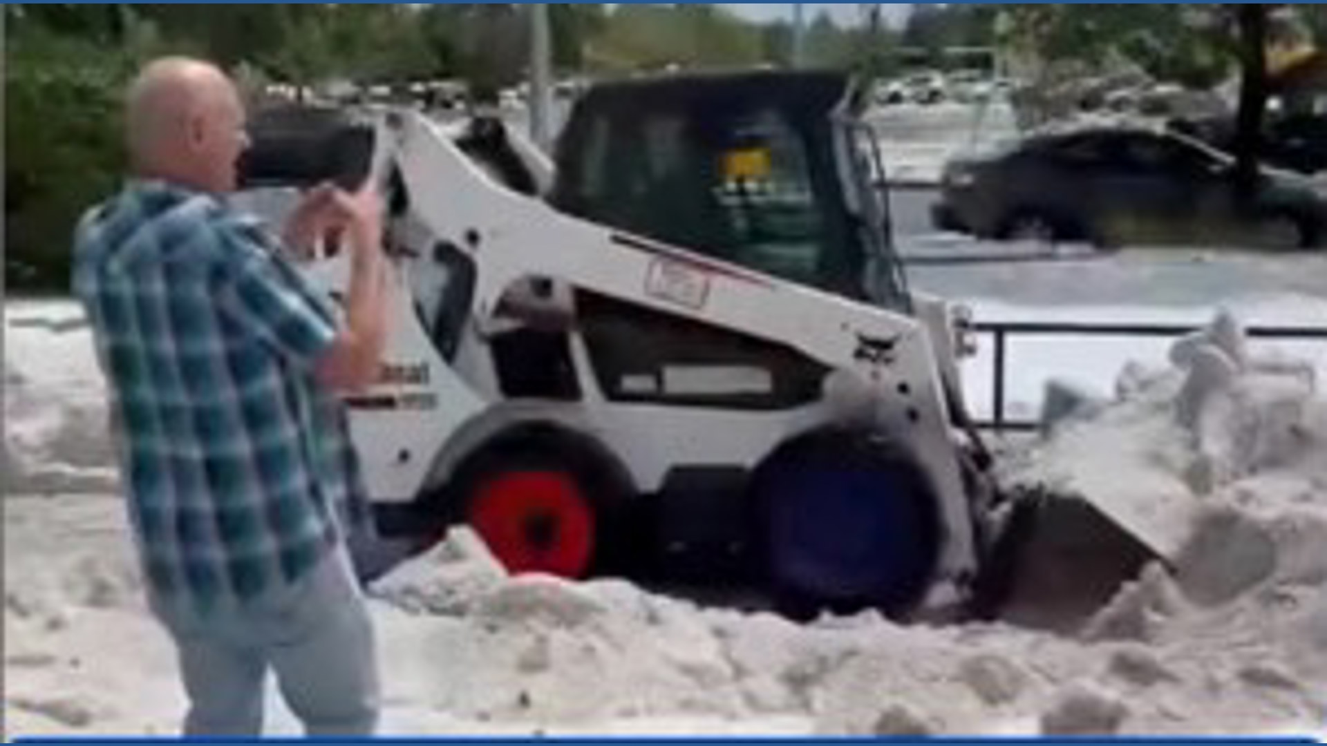 Bulldozer used to clear hail after storms in Colorado